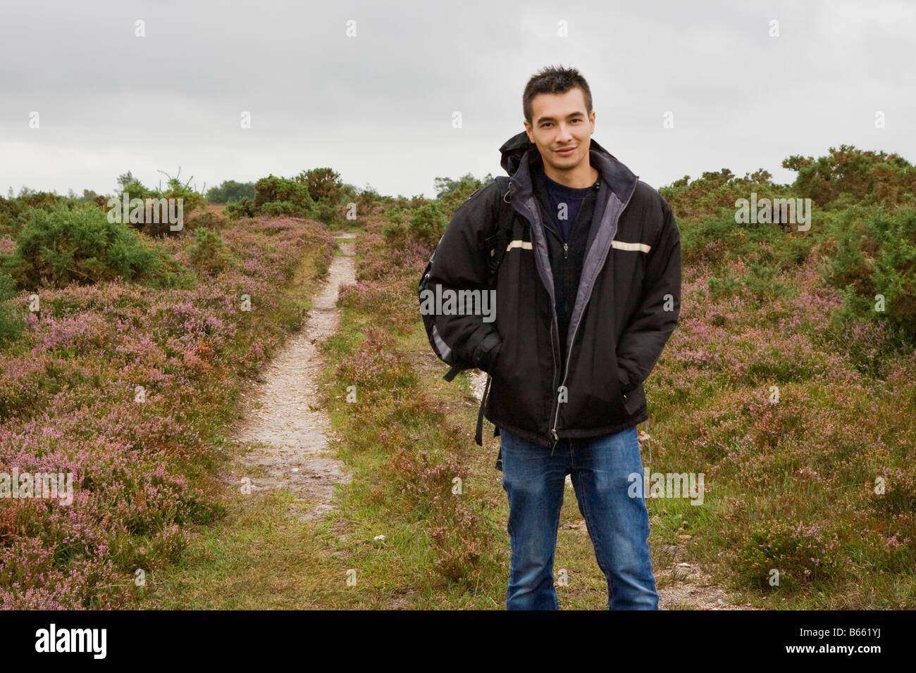 Portrait of a young man in the countryside in The New Forest, England ...