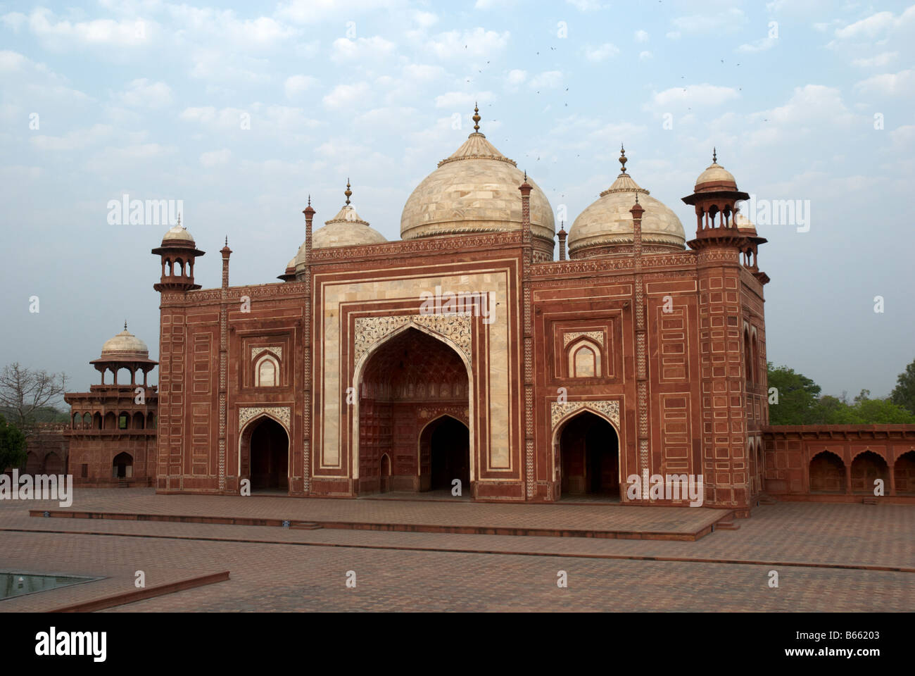 A red sandstone Mosque at the Taj Mahal complex in Agra, India Stock ...