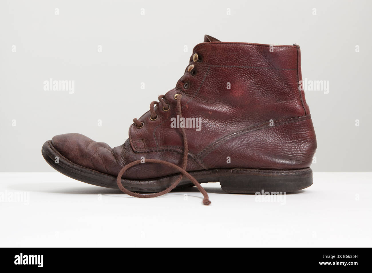 old boot on white Stock Photo - Alamy