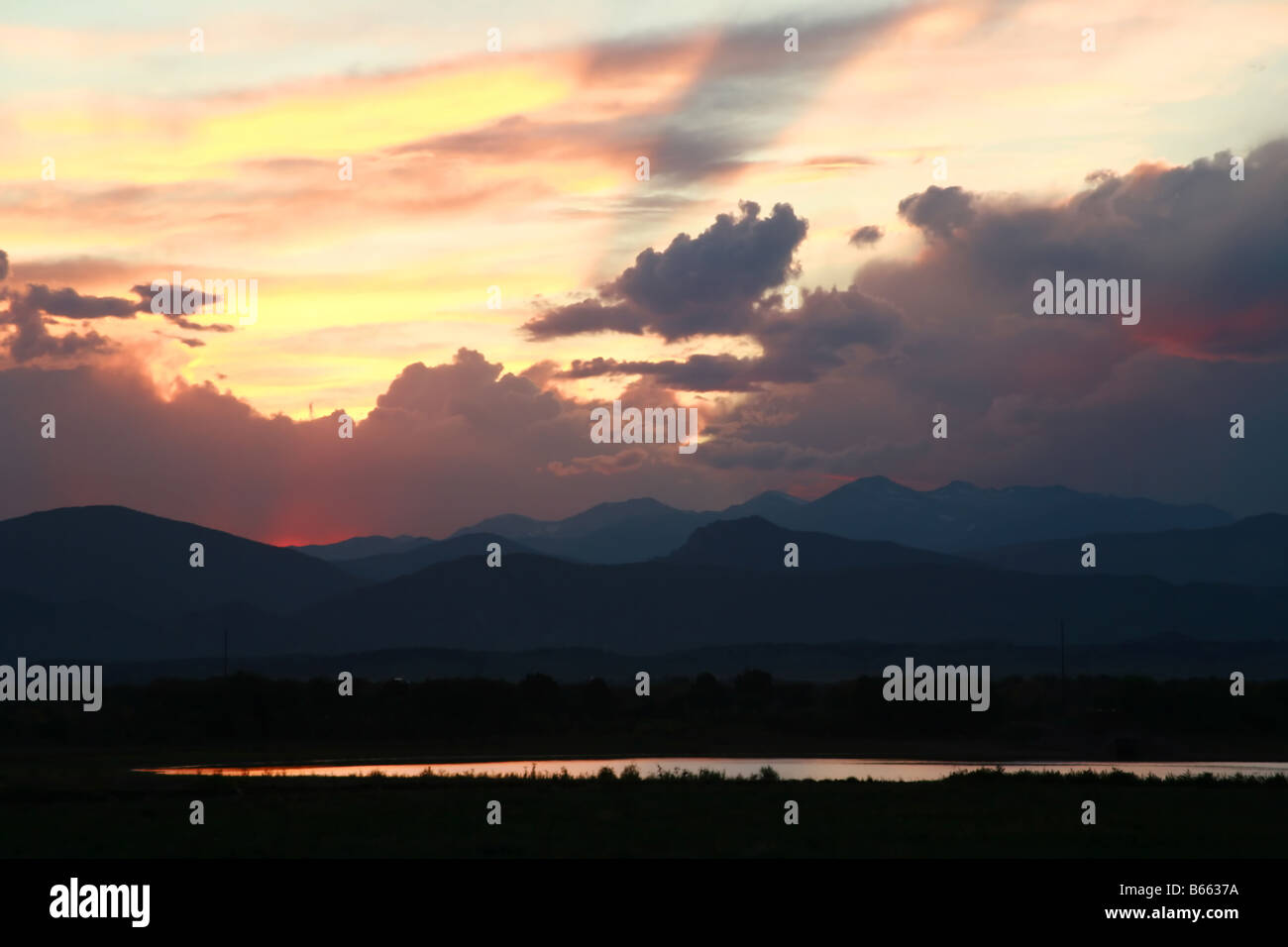 Sunset clouds mountains hi-res stock photography and images - Alamy