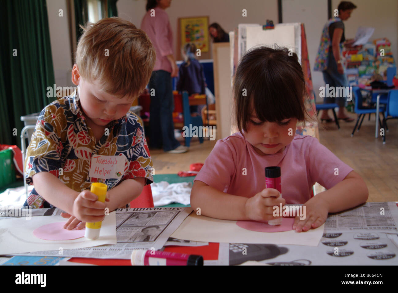 Sticking child glue hi-res stock photography and images - Alamy