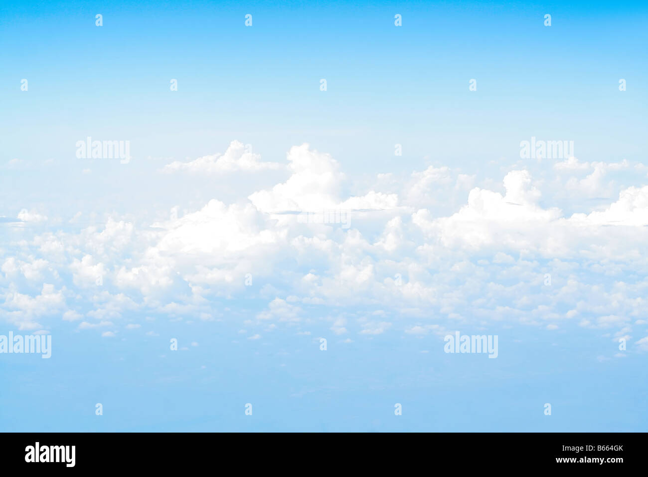 A view of clouds and blue sky from an aerial view Stock Photo - Alamy