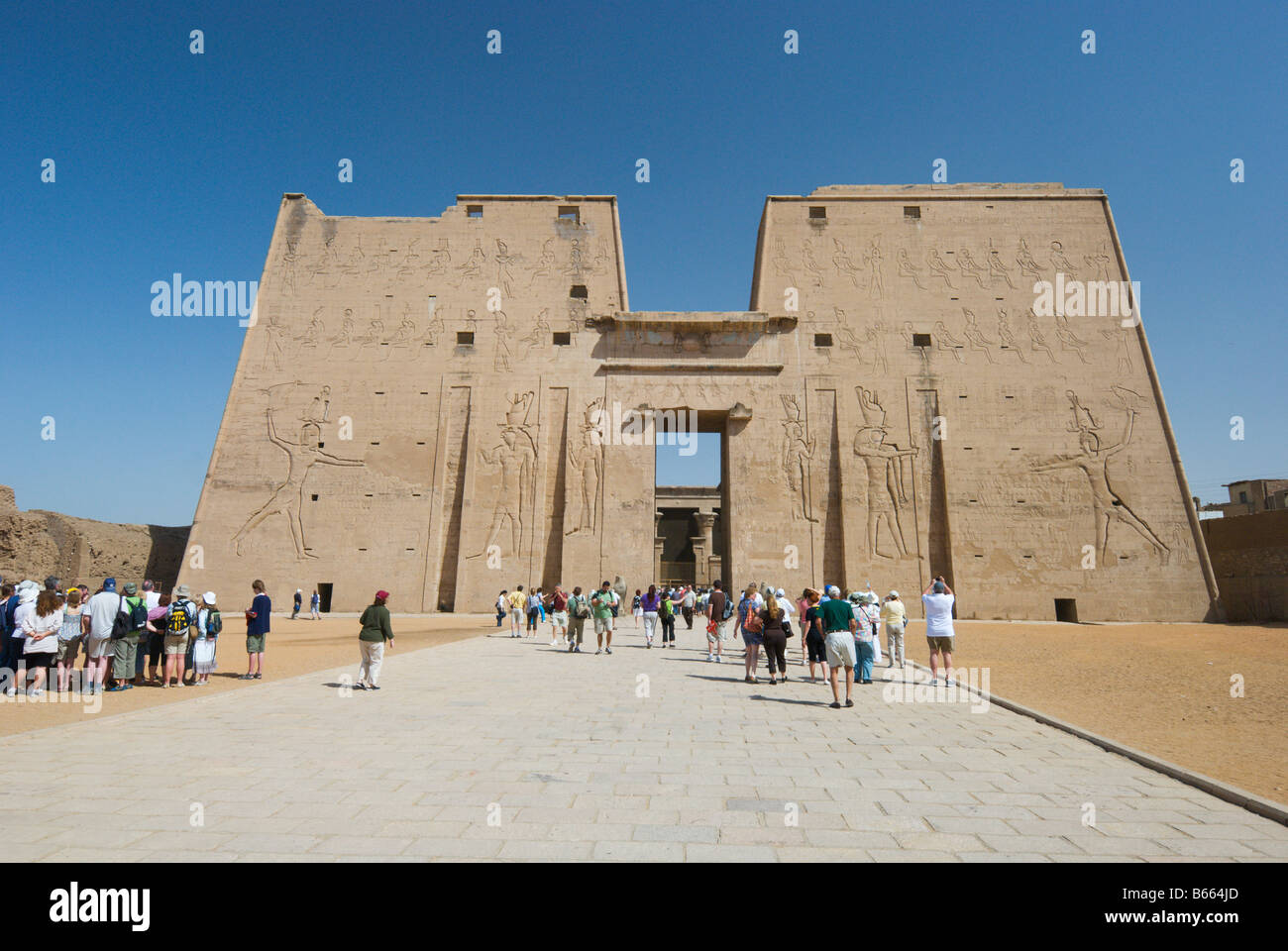 The ruins and remains of the front entrance to the Horus Temple at Edfu ...