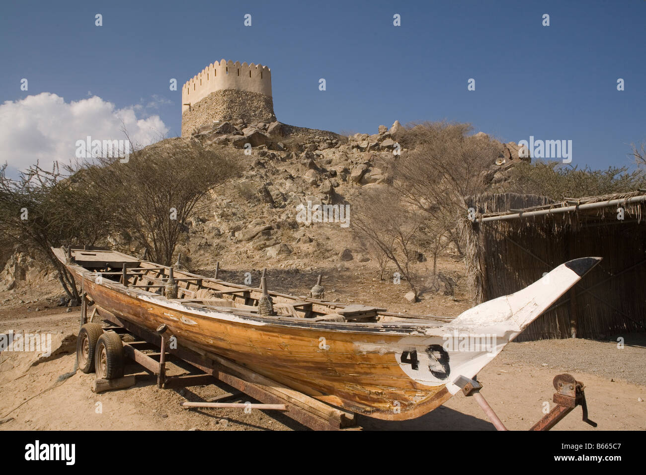 United Arab Emirates Fujairah Badiya mosque watchtower & boat Stock ...