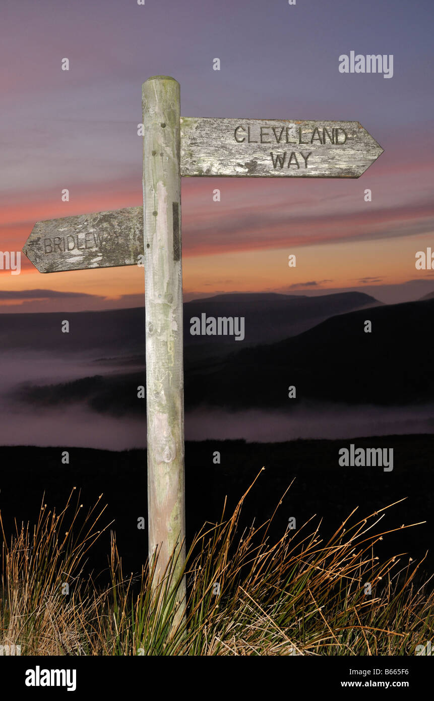 Cleveland Way signpost at sunset Clay Bank North York moors Stock Photo ...