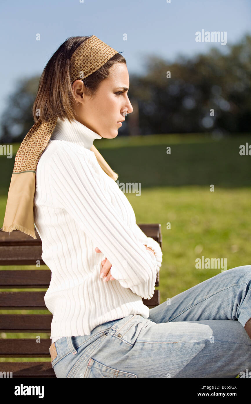 Young woman angry in a park Stock Photo - Alamy