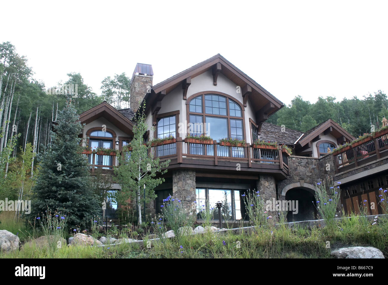 A luxury mountain home on a hillside in the colorado rockies Stock ...