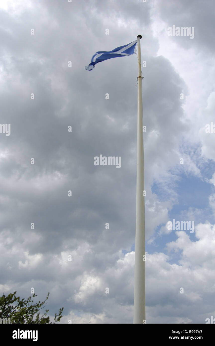 Scottish flag Saltire on flag pole against broken could sky Stock Photo ...