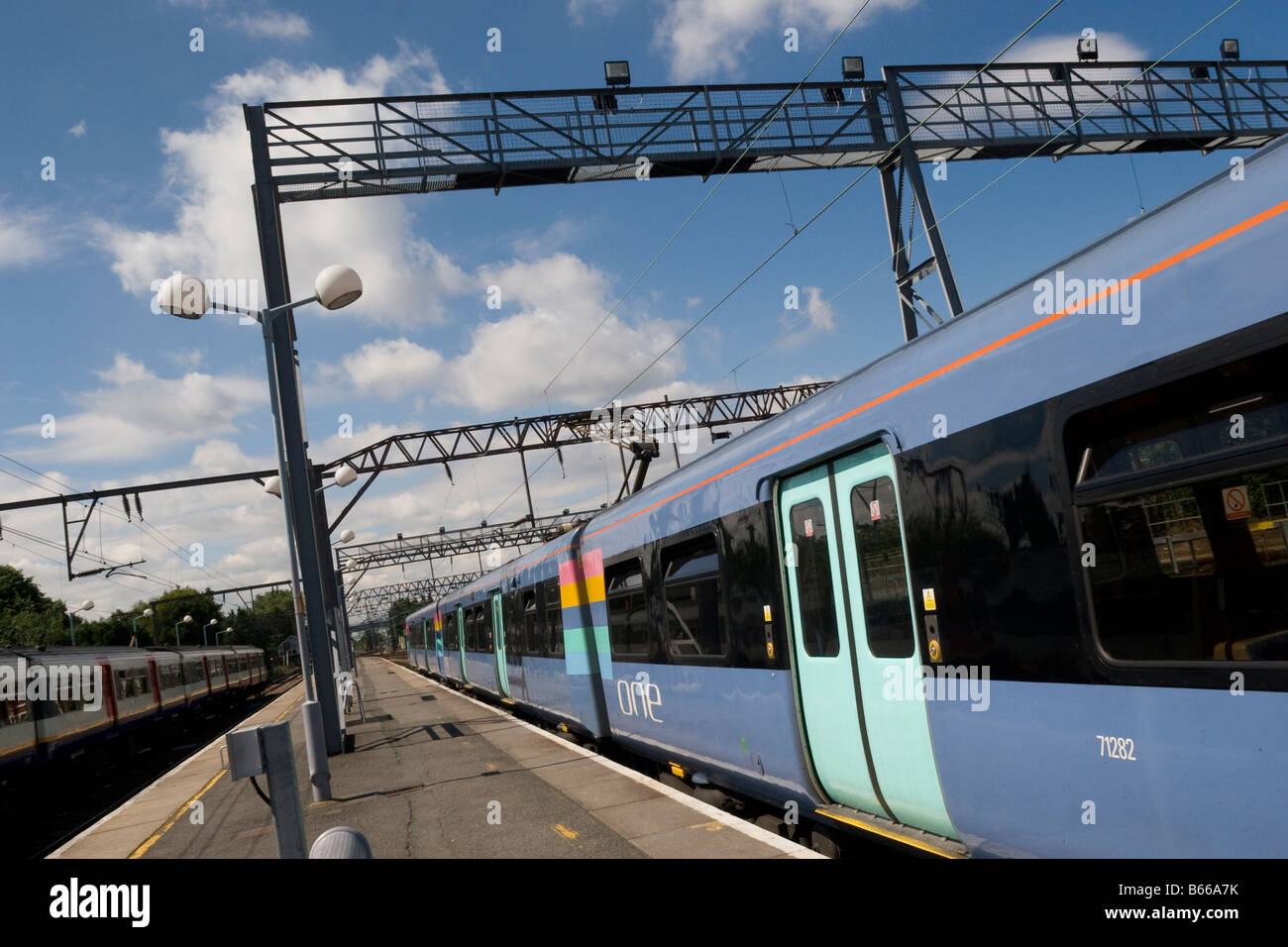 Blue ONE Train on Platform Stock Photo - Alamy