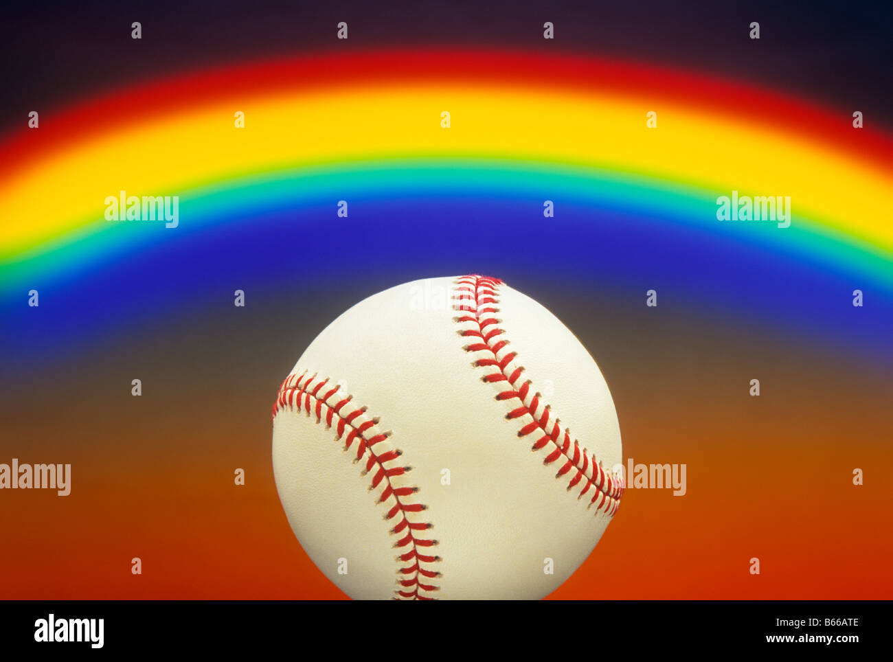 Still life of a baseball with a rainbow background Stock Photo - Alamy