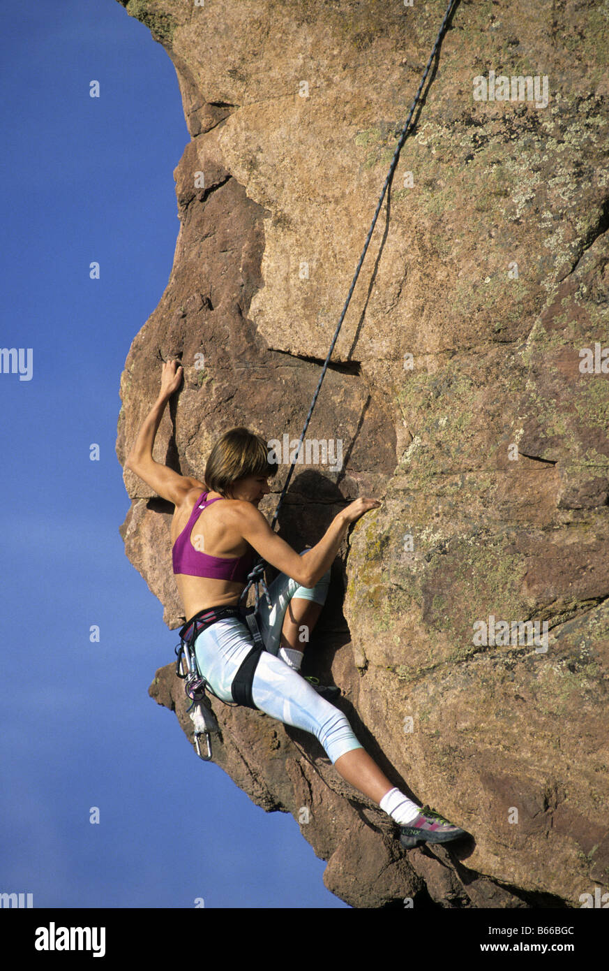 Female rock climber Stock Photo - Alamy