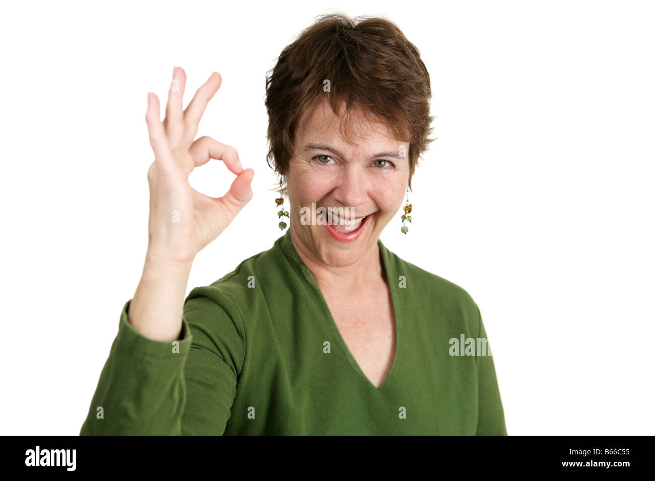 An adorable fifty year old Irish woman giving the okay hand sign Stock ...