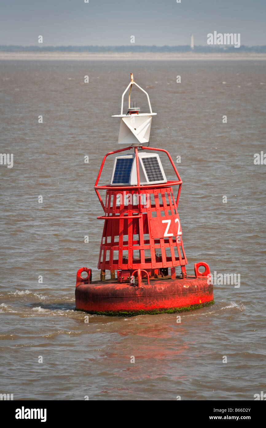 Red shallow water warning buoy at wadden sea Stock Photo - Alamy