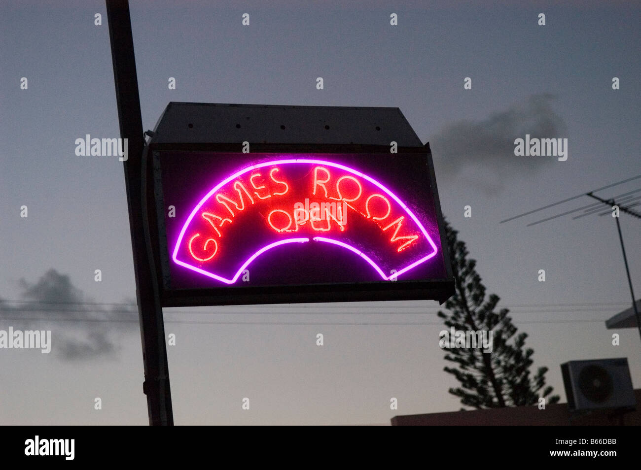 Games room open neon sign outside pub Stock Photo - Alamy