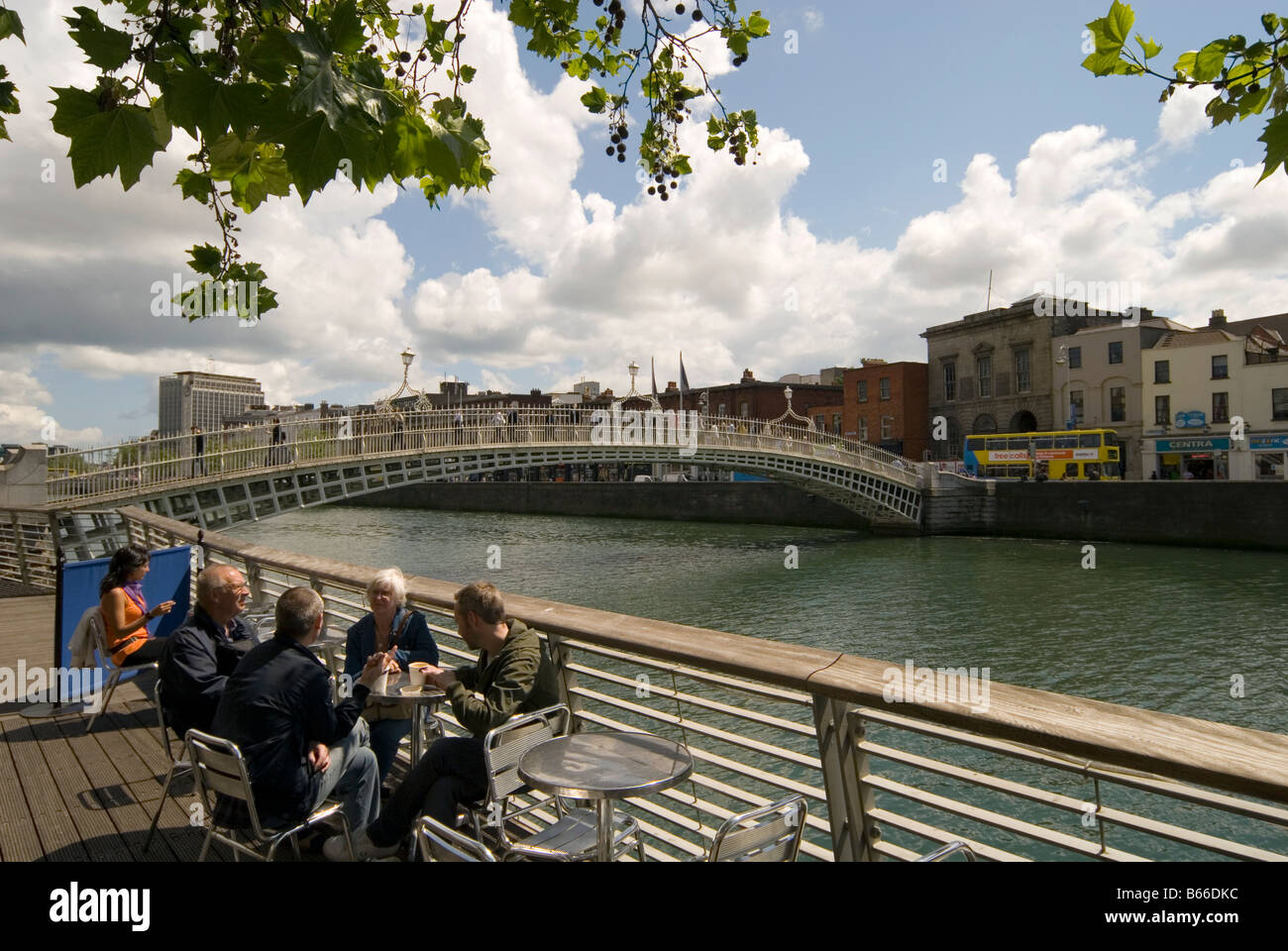 People drinking by River Liffey, Dublin Island Stock Photo - Alamy