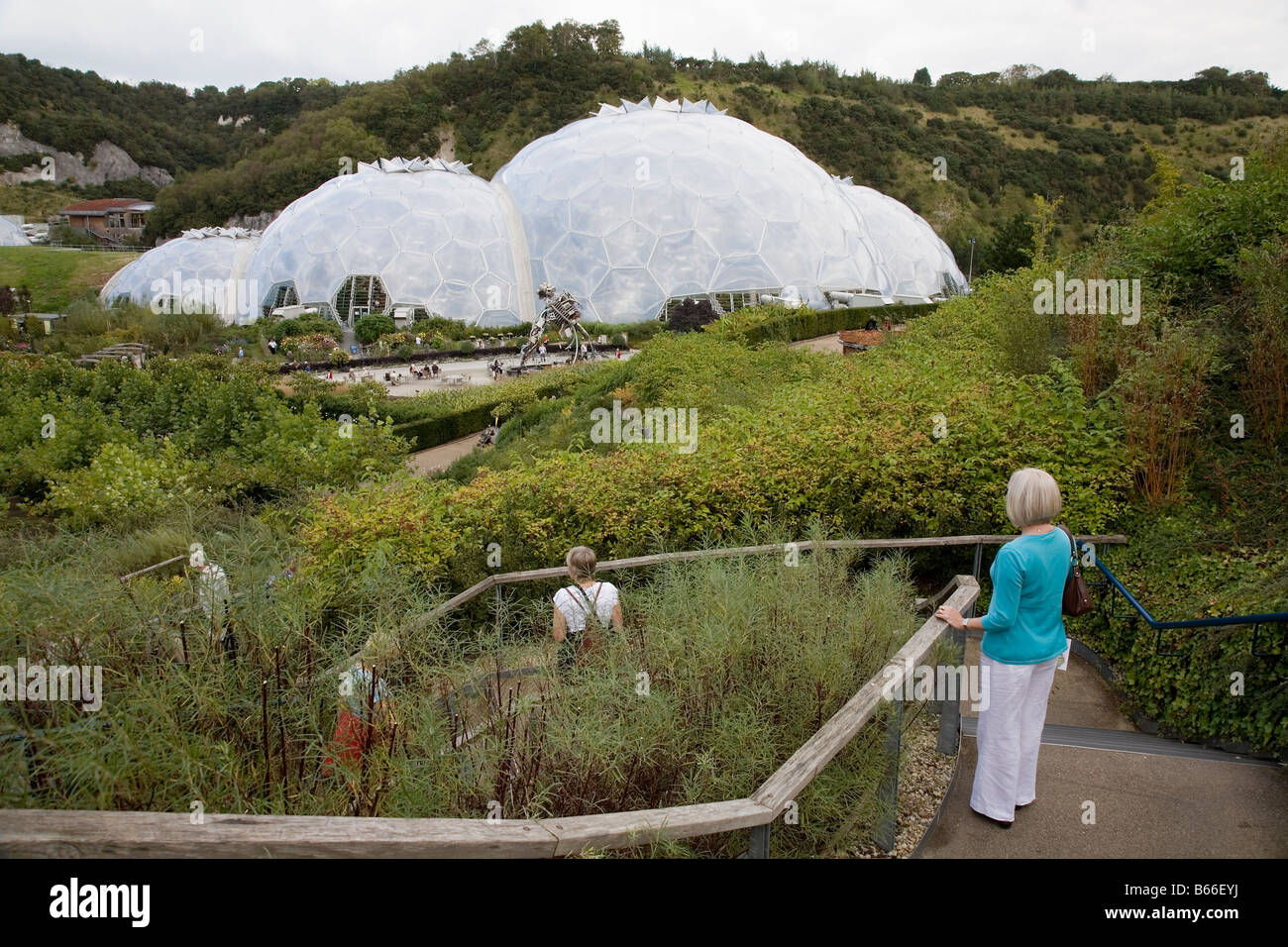 Visitor looking at the Eden Project Biome spheres Stock Photo - Alamy