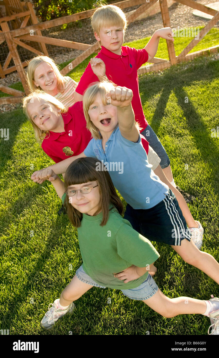 Kids having fun at the playground Stock Photo - Alamy