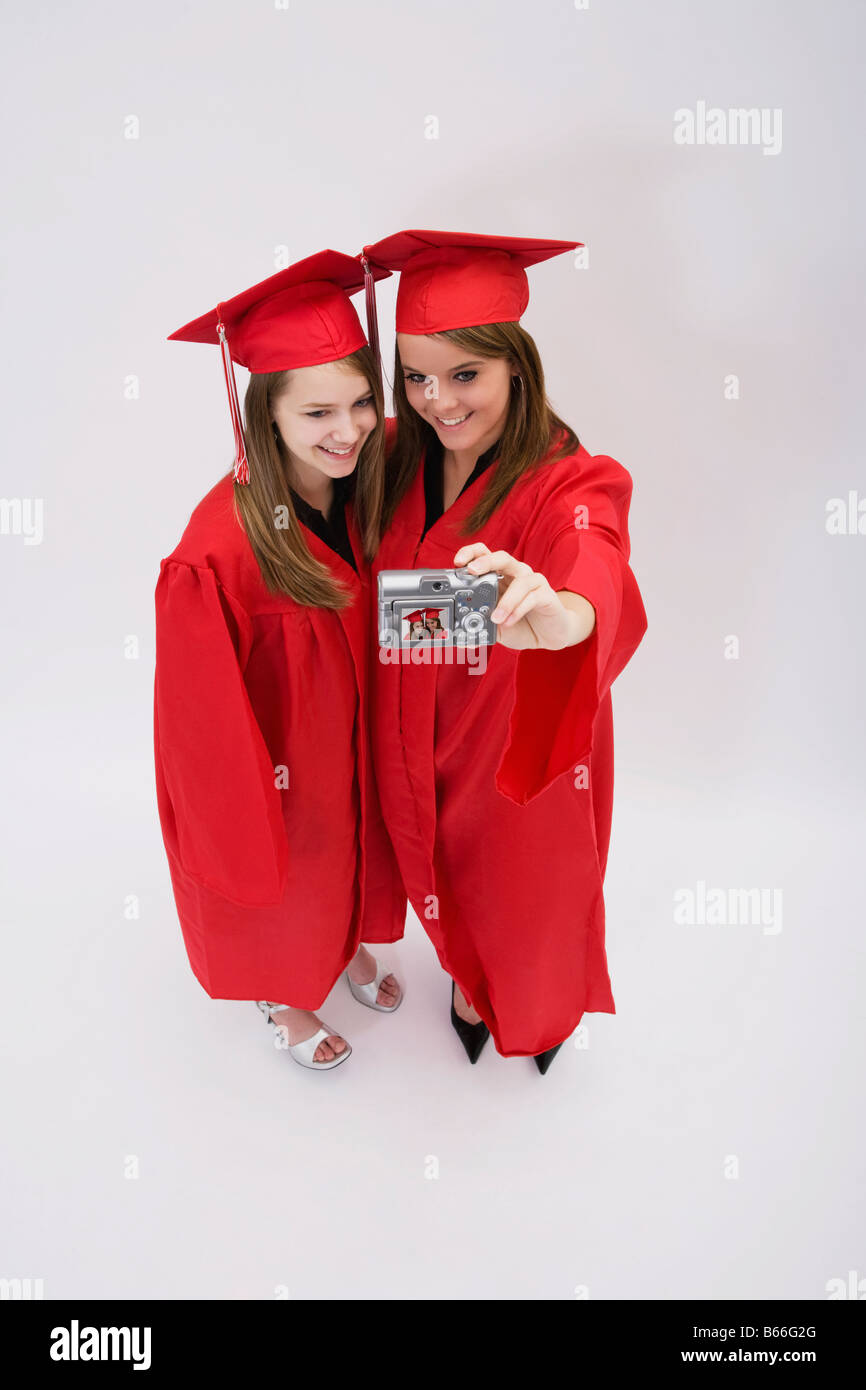 Two high school graduate girls High Resolution Stock Photography and ...