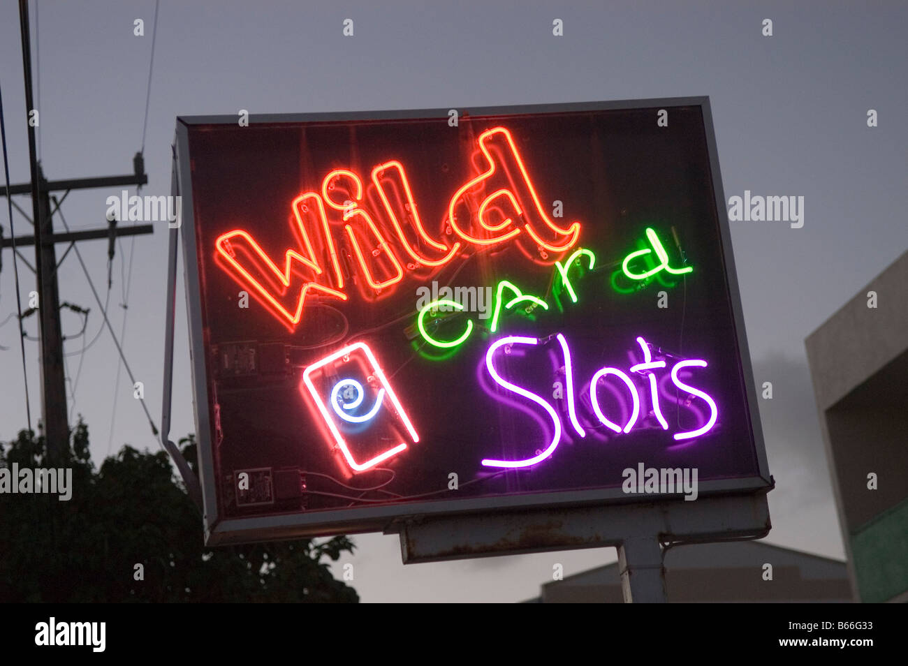 Games room open neon sign outside pub Stock Photo - Alamy
