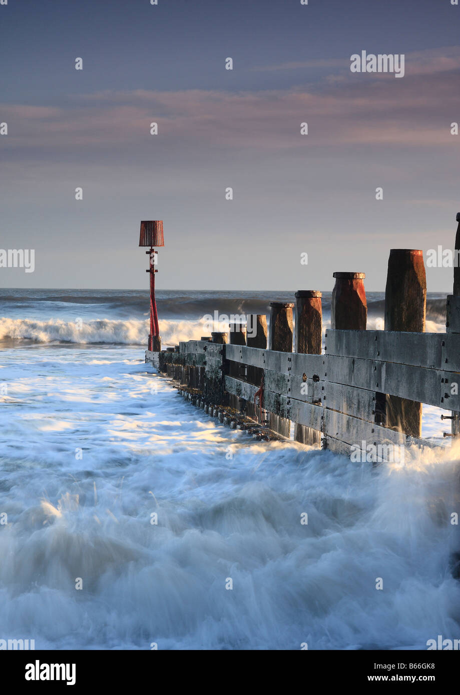 Redcar Sea defence Groins at Sunrise with powerful incoming waves Sea ...