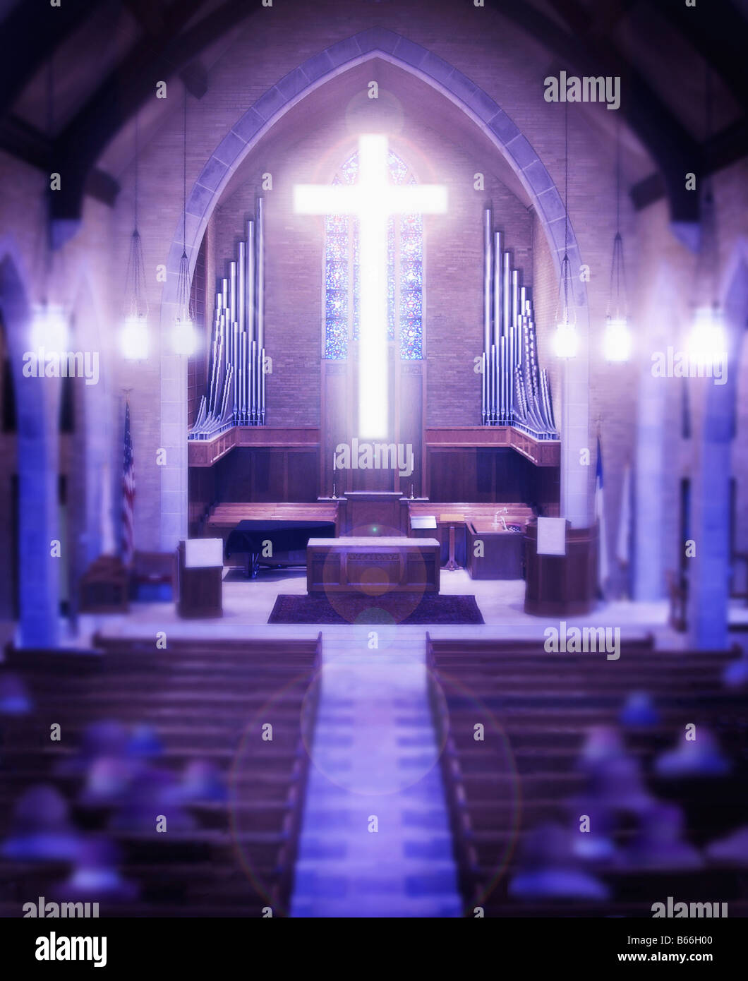 Church interior with illuminated cross Stock Photo - Alamy