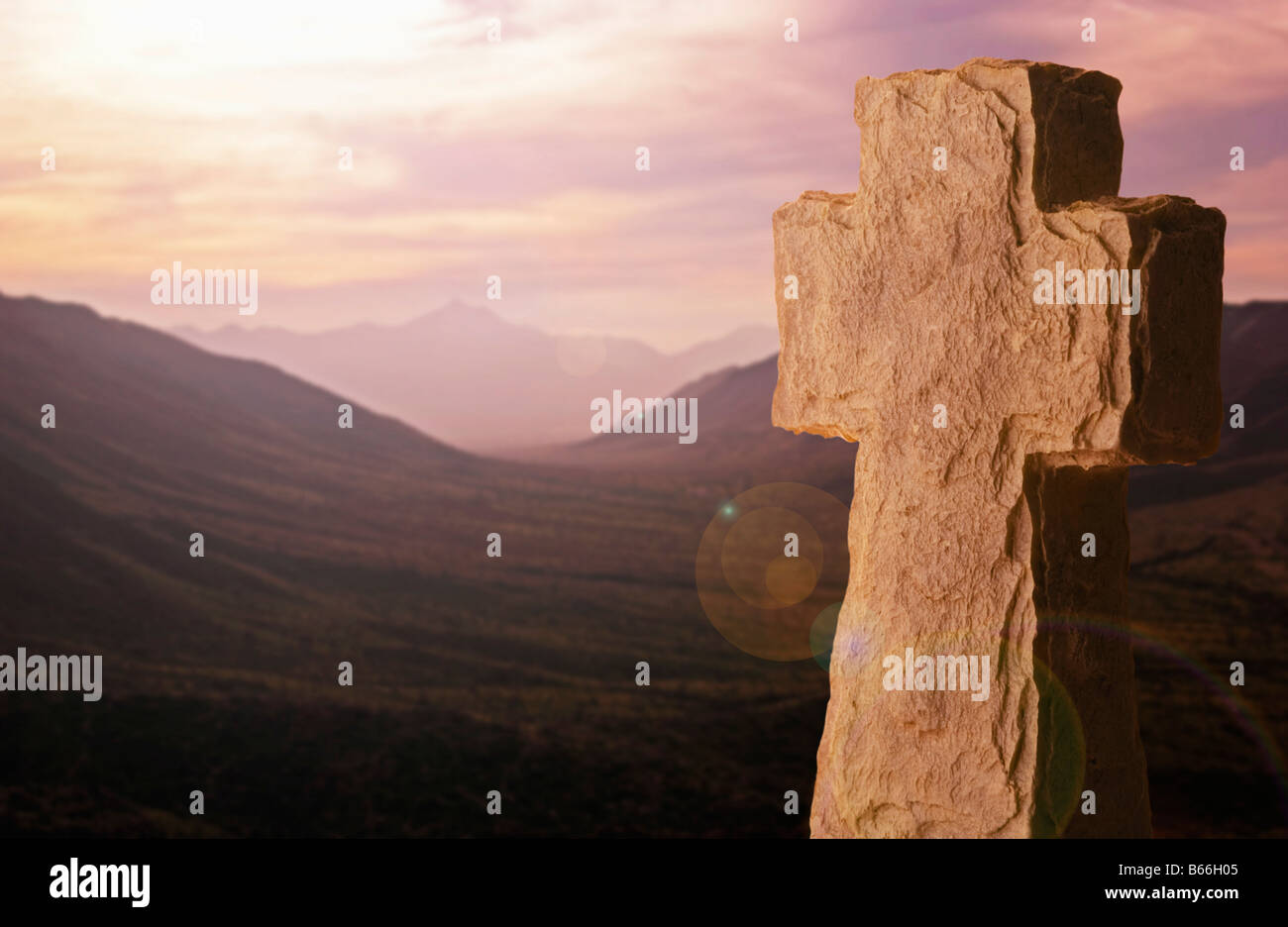 Stone cross in landscape Stock Photo - Alamy