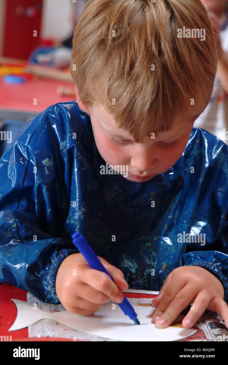 Child Colouring a picture at nursery school Stock Photo - Alamy