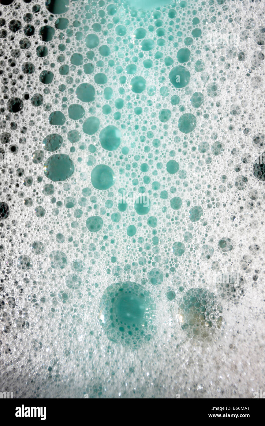 Soap bubbles in dishwater Stock Photo - Alamy