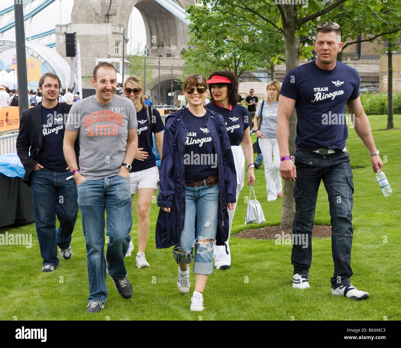 Portrait of Danni Minogue and her entourage at The Crusaid Walk For ...