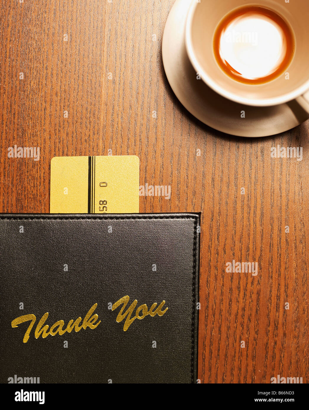 Credit Card Payment Beside Coffee Cup Stock Photo - Alamy