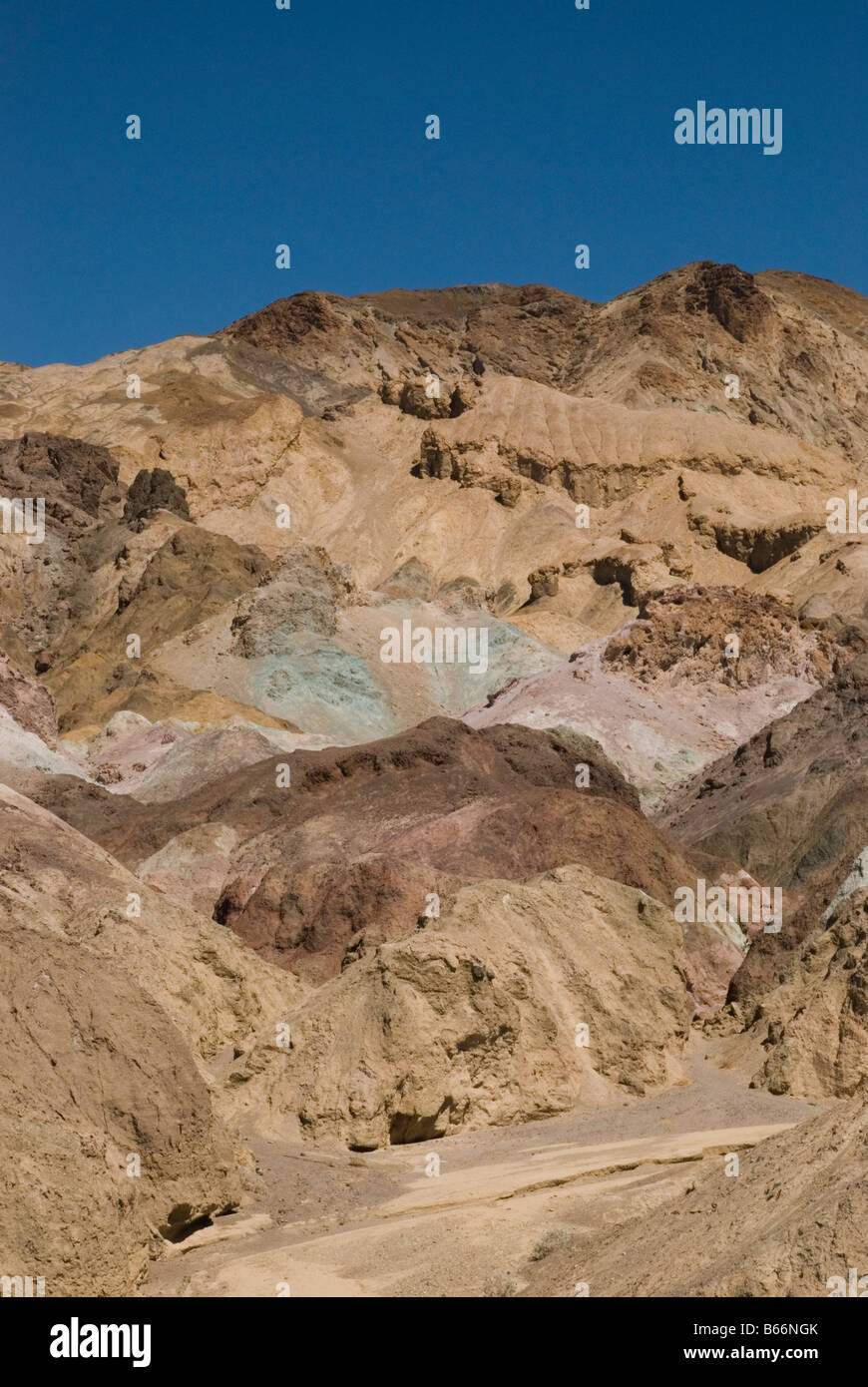 yellow mountains in the dead valley national park with different ...