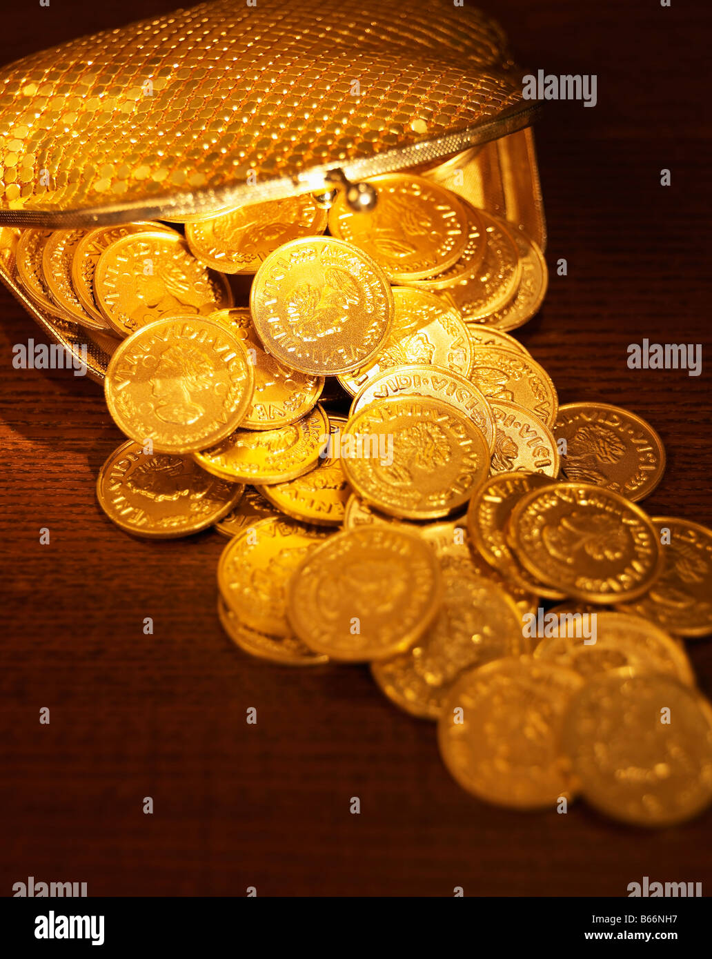 Overflowing purse hi-res stock photography and images - Alamy