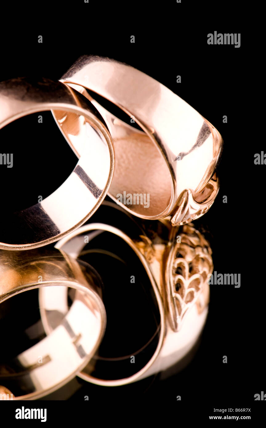 object on black Golden ring closeup Stock Photo - Alamy