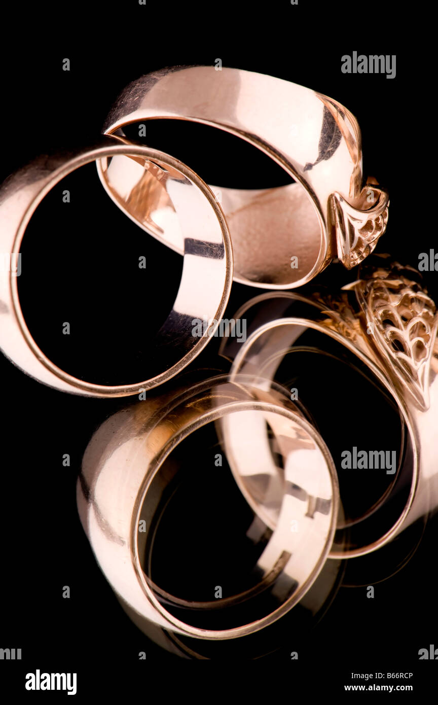 object on black Gold ring macro on black Stock Photo - Alamy