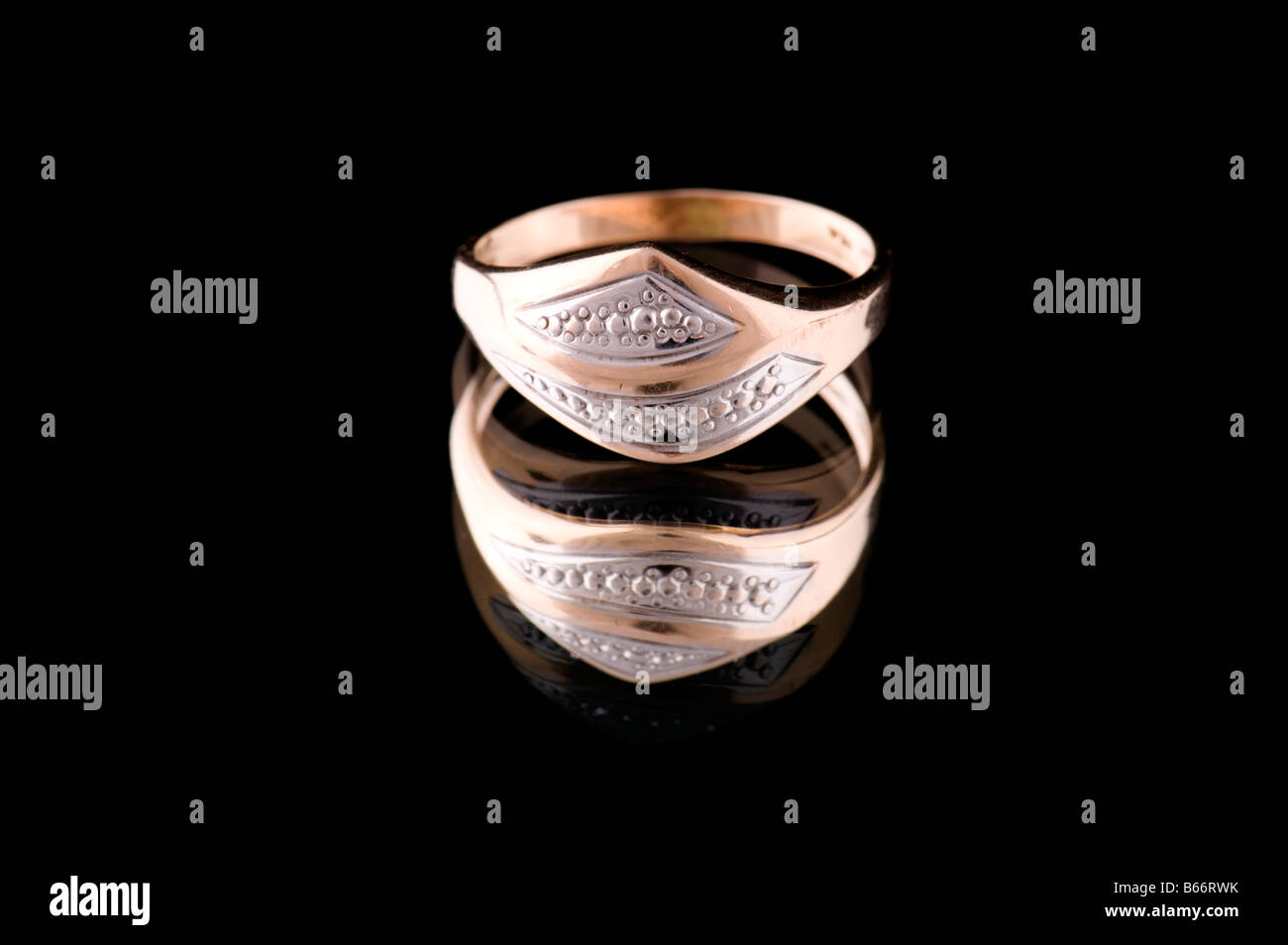 object on black Golden ring closeup Stock Photo - Alamy
