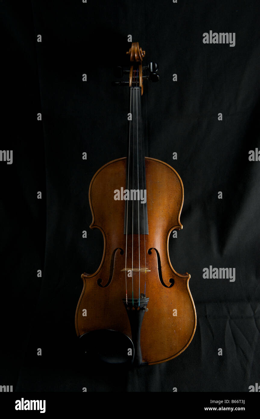 Violin on black background in studio Setting Stock Photo - Alamy