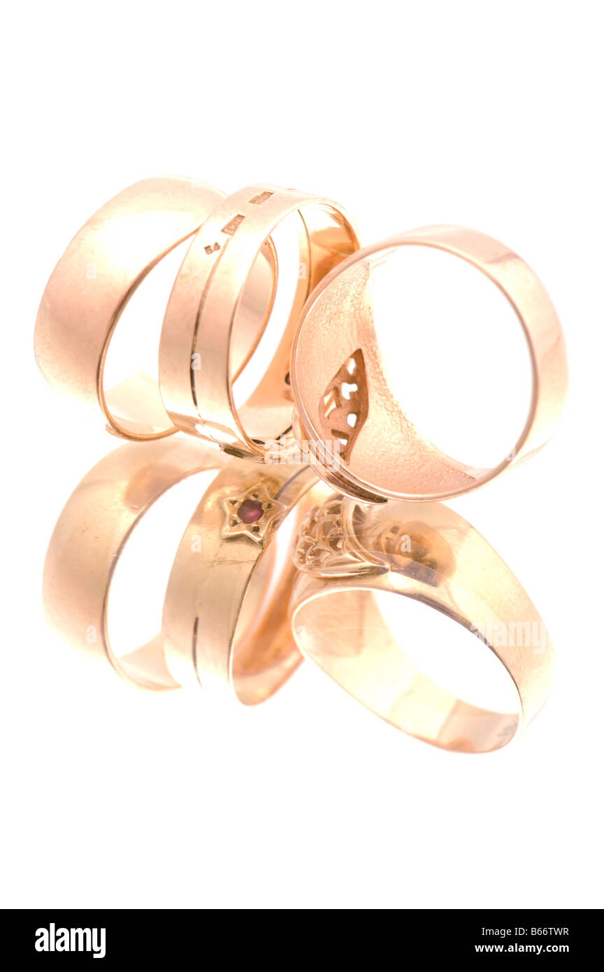 object on white Golden rings on white Stock Photo - Alamy