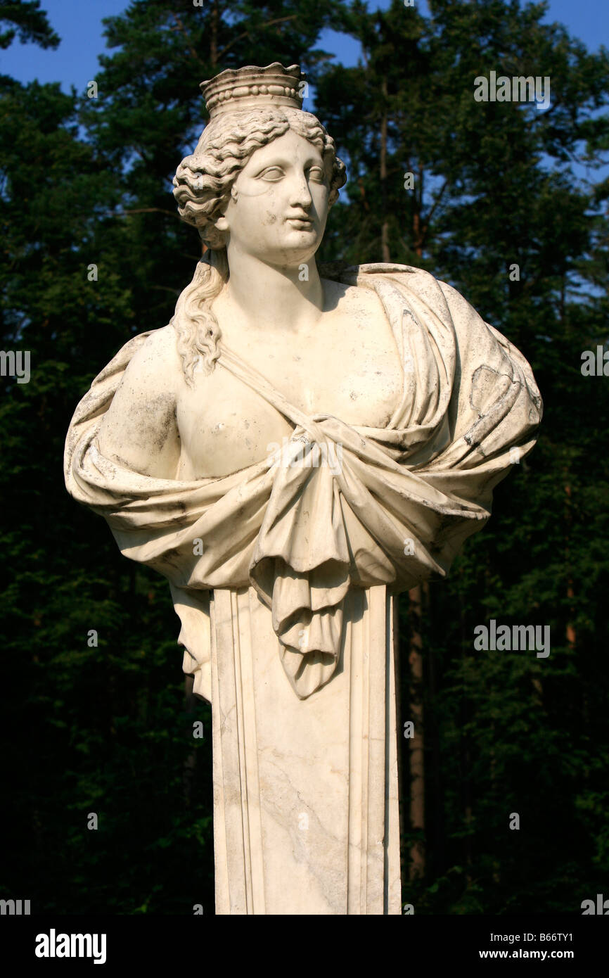 A neoclassical statue of a woman in the gardens of the 18th century ...