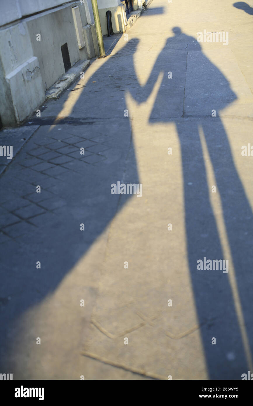 Shadow of Couple Holding Hands Stock Photo - Alamy