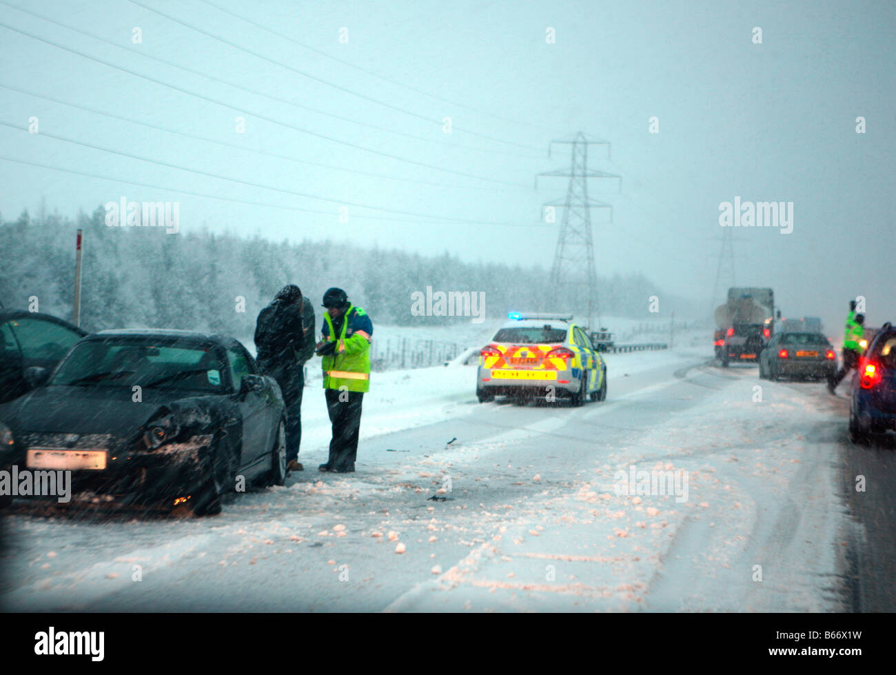 Police car in snow hi-res stock photography and images - Alamy