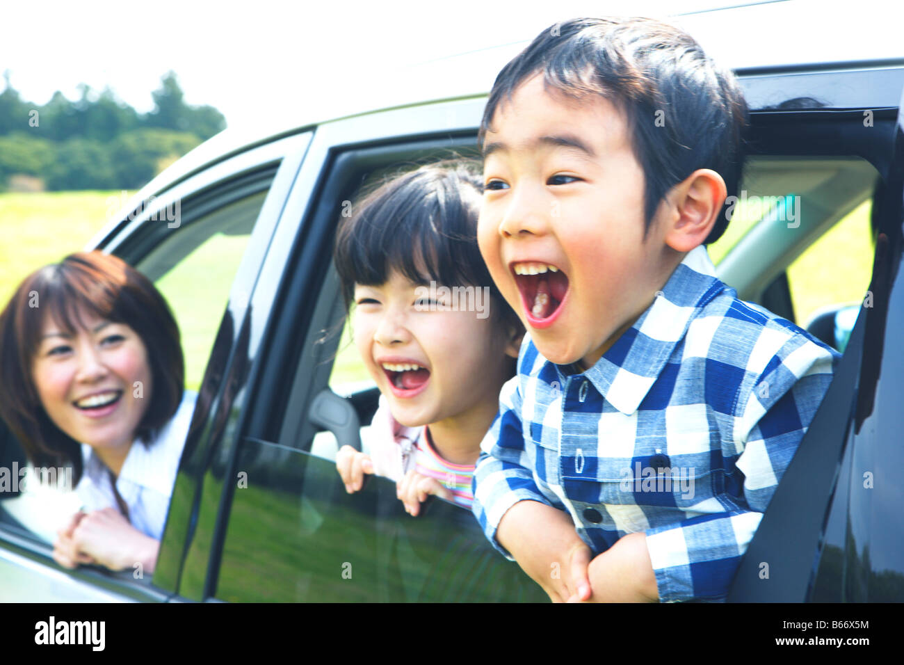 Two children in car window hi-res stock photography and images - Alamy