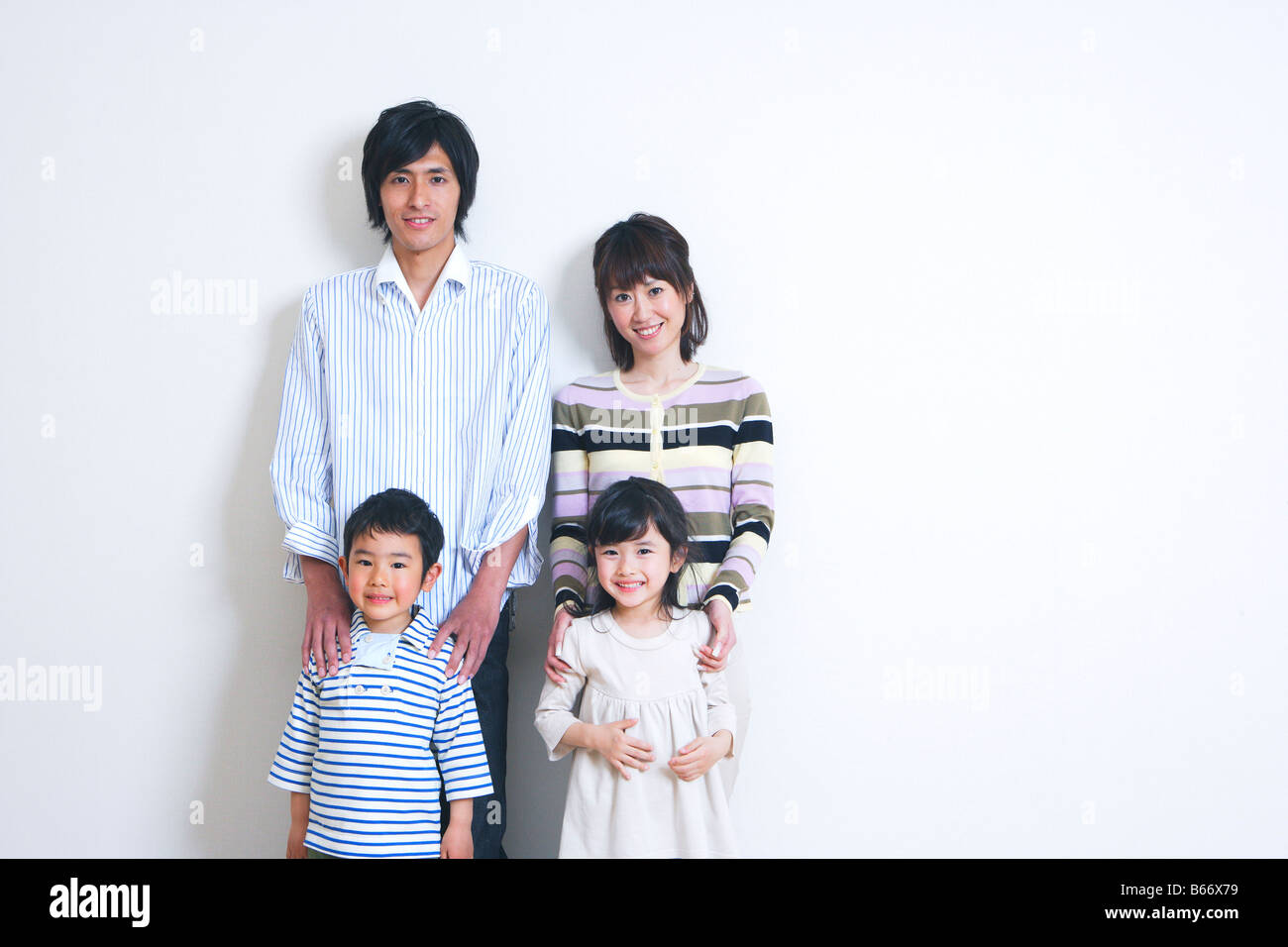 Portrait of Family of Four Stock Photo - Alamy