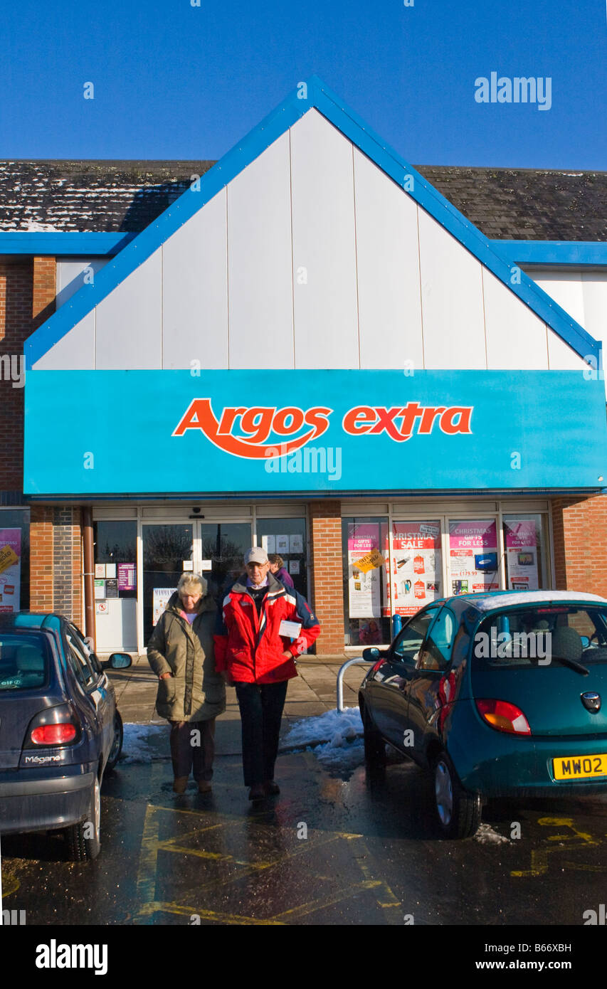 Argos Extra on retail park with shoppers emerging Stock Photo - Alamy