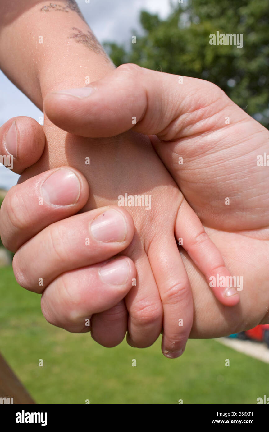 Child shaking hands with adult hi-res stock photography and images - Alamy