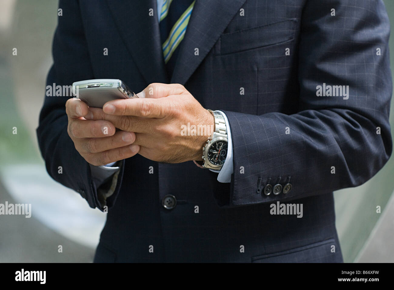 Person using handheld wall hi-res stock photography and images - Alamy