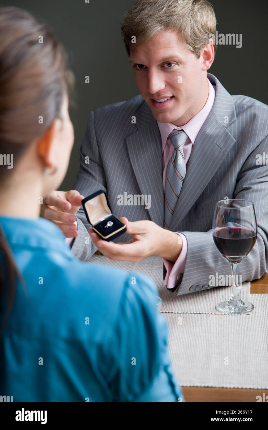 A man proposing to a woman Stock Photo - Alamy