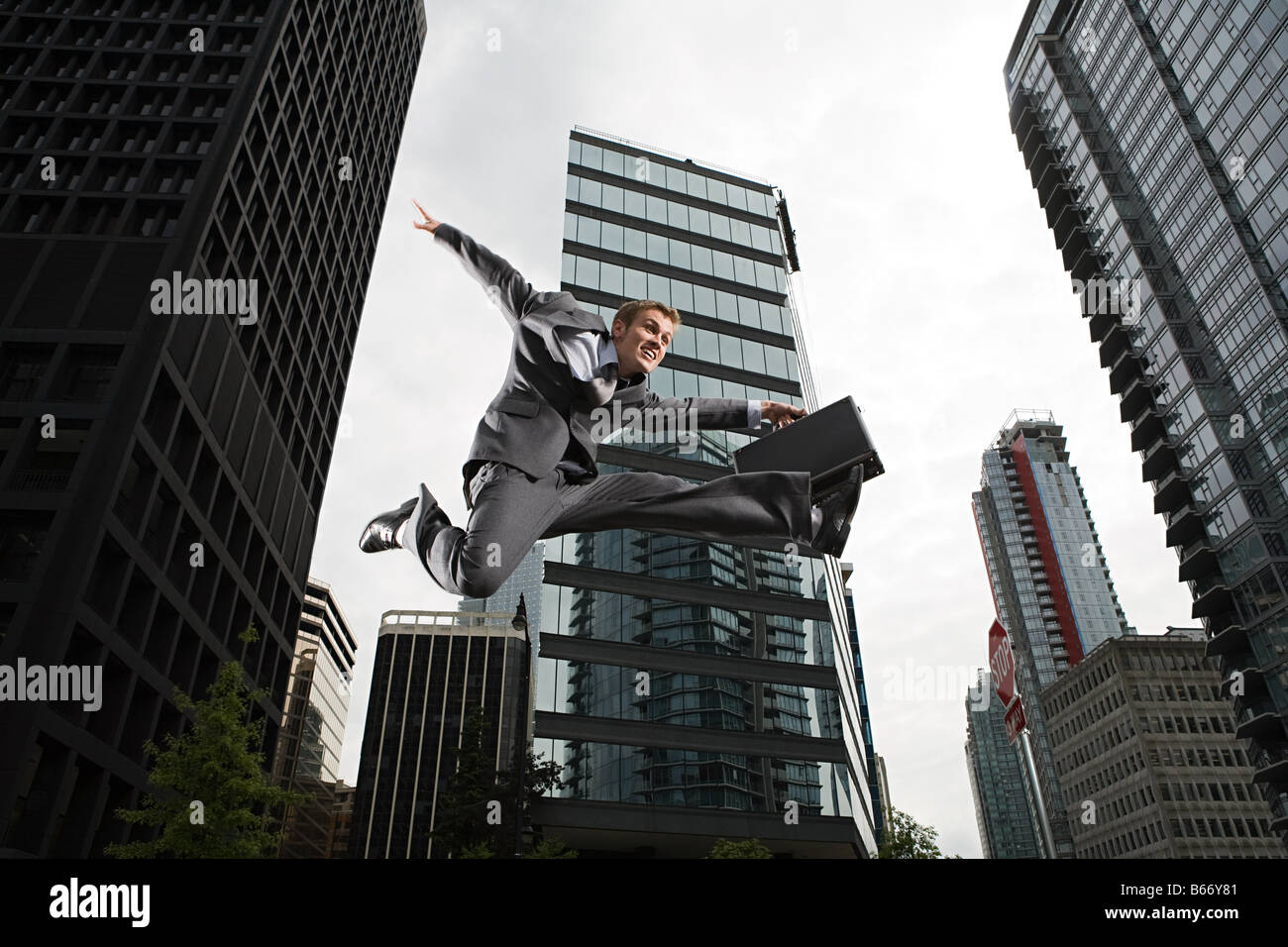 Businessman jumping hi-res stock photography and images - Alamy