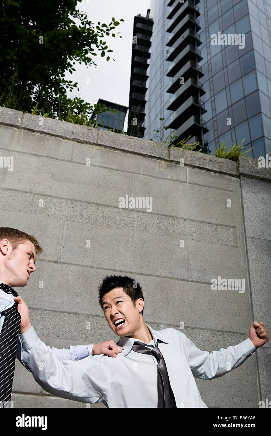 Two men fighting street hi-res stock photography and images - Alamy