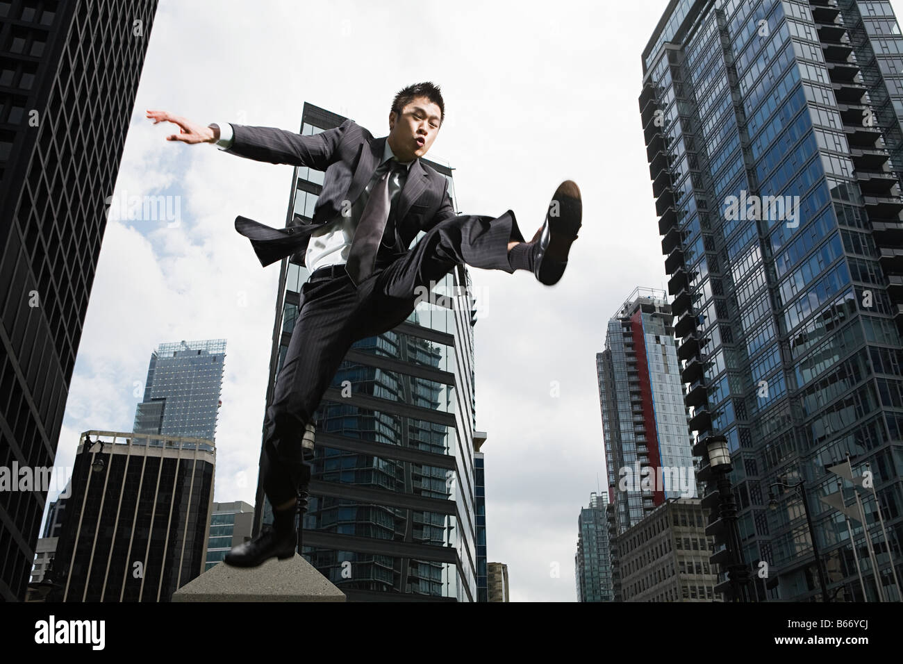 Businessman jumping hi-res stock photography and images - Alamy