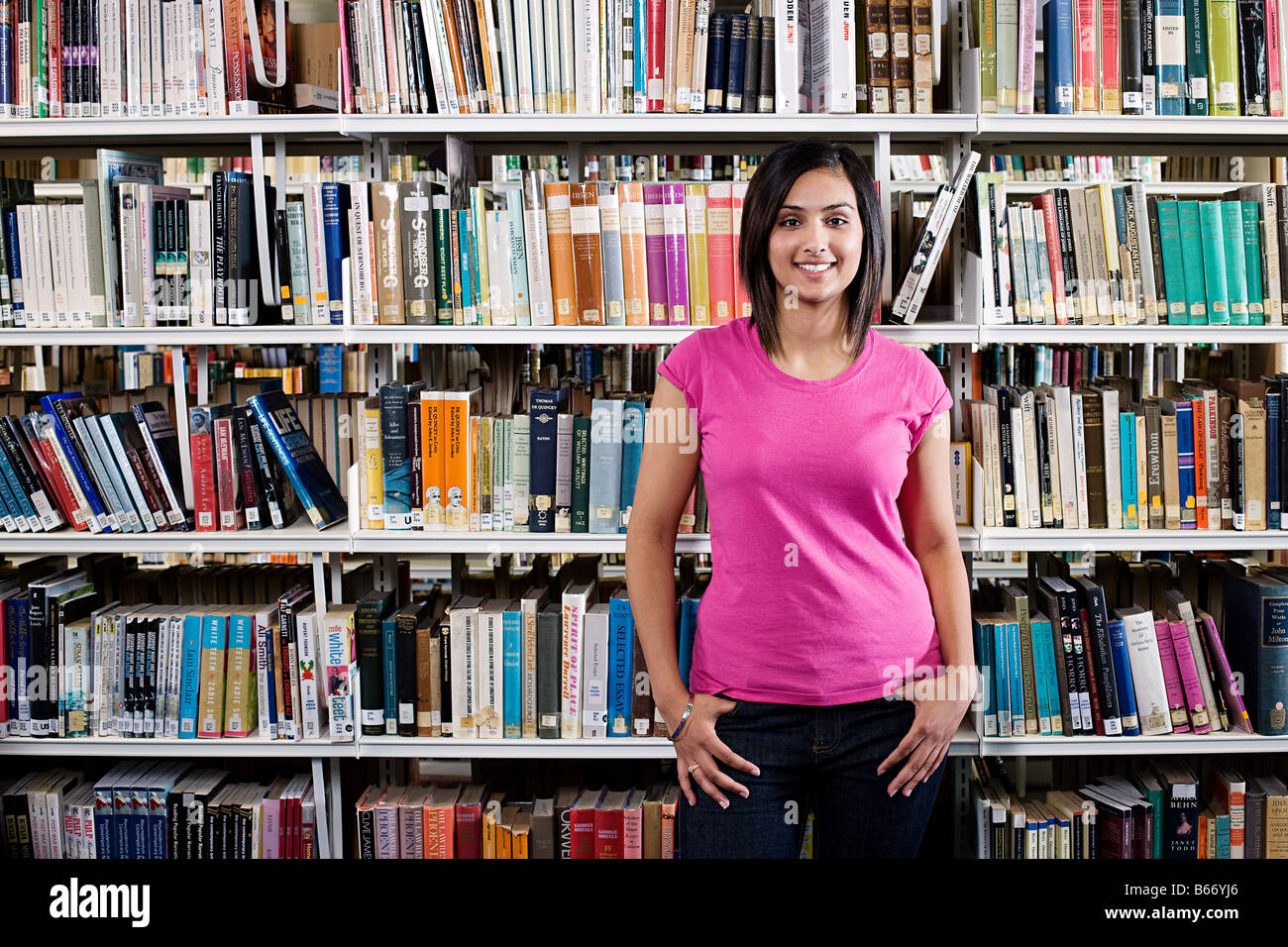 Woman in library hi-res stock photography and images - Alamy